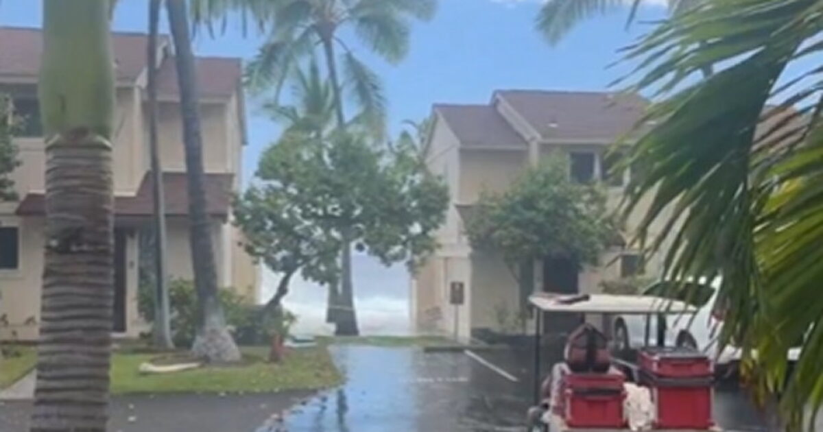 WATCH: Huge Hawaii wave washes over condo roof, rips shingles off
